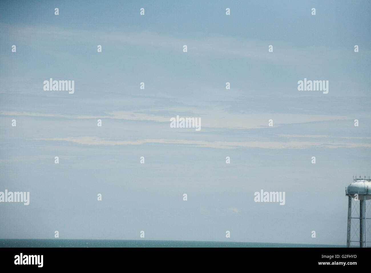 Water Tank Against Blue Sky Stock Photo - Alamy