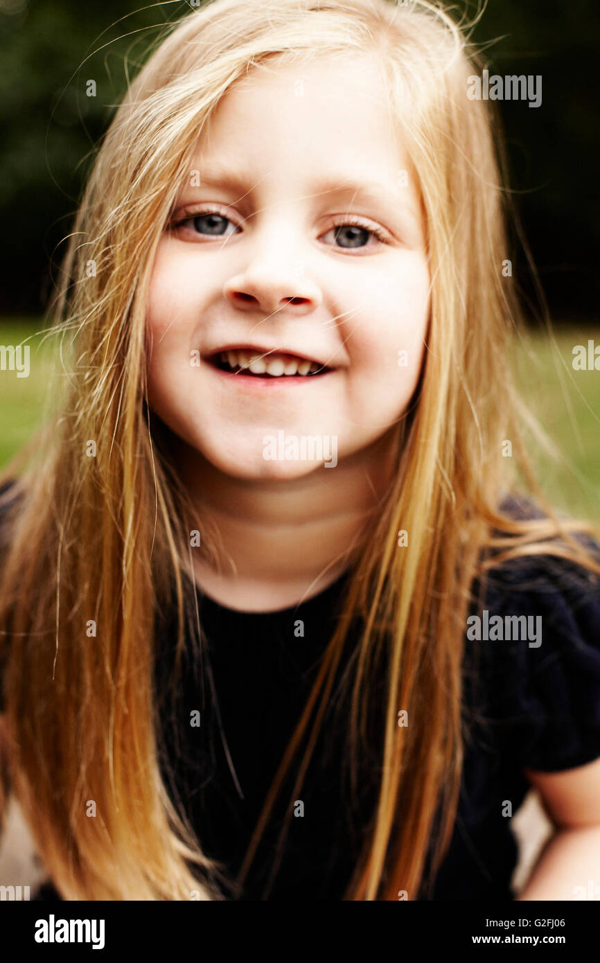Smiling Blond Girl Stock Photo - Alamy
