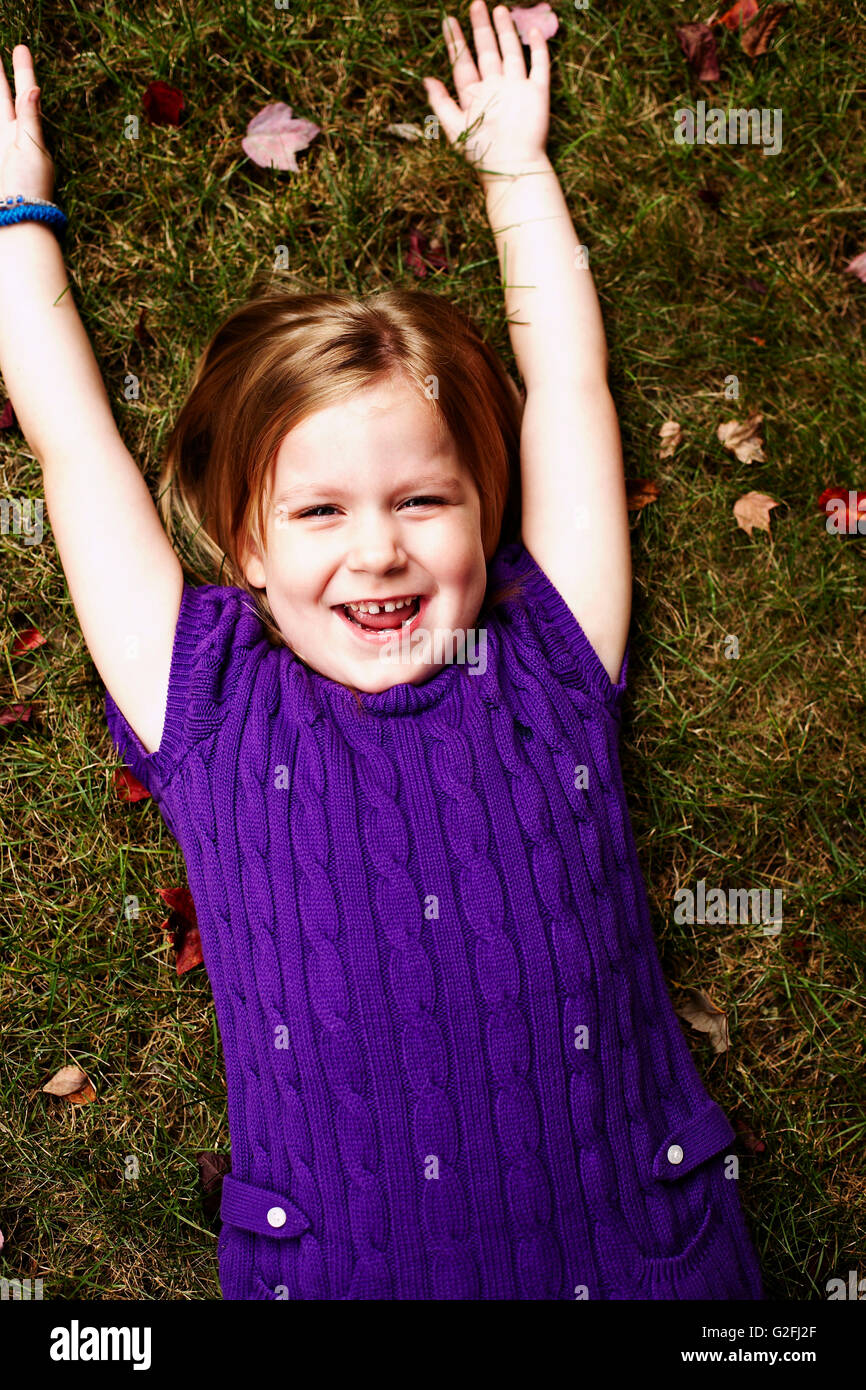 Girl Laying On Ground High Resolution Stock Photography and Images - Alamy
