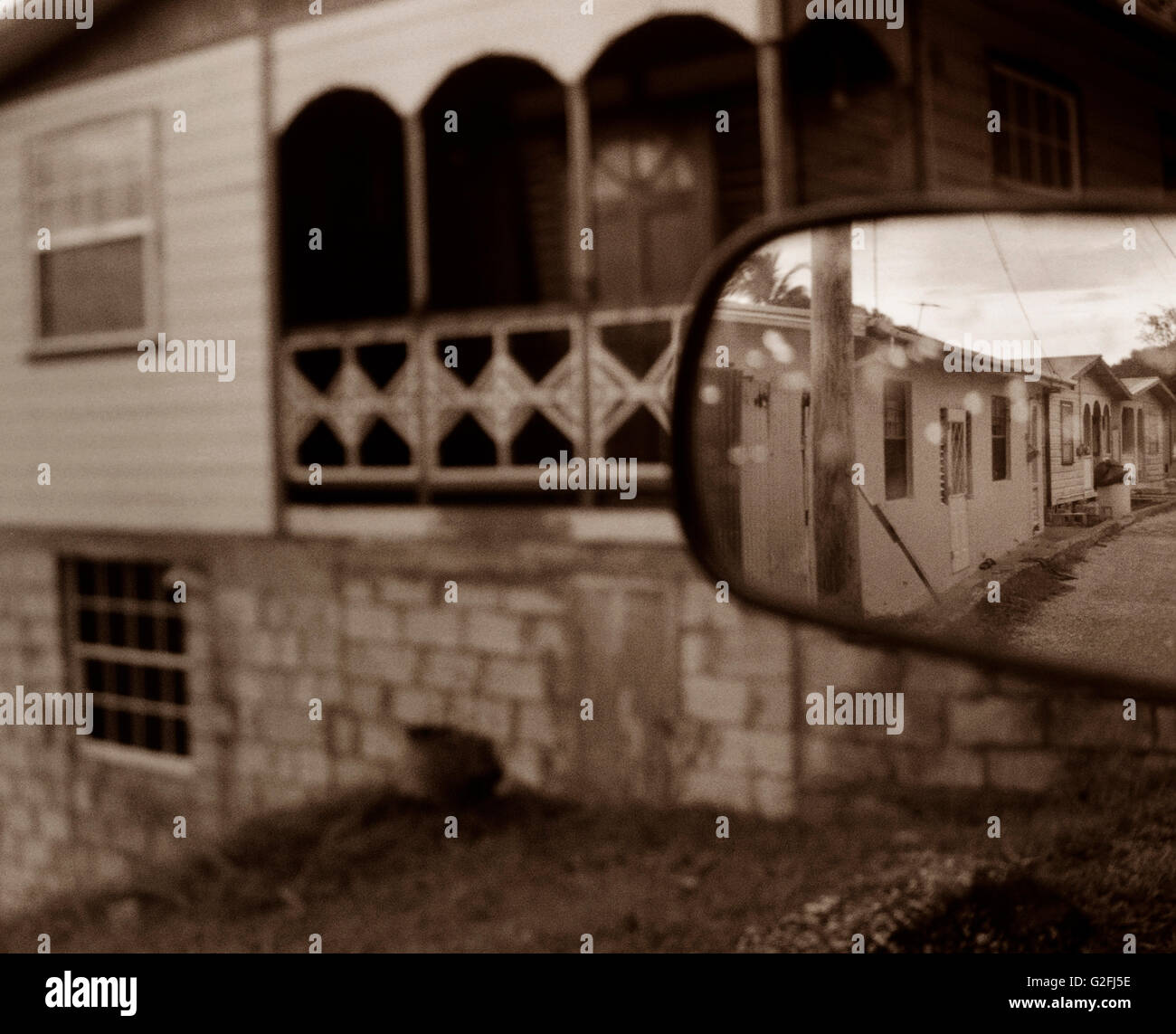 Small Houses in Rearview Mirror Stock Photo - Alamy