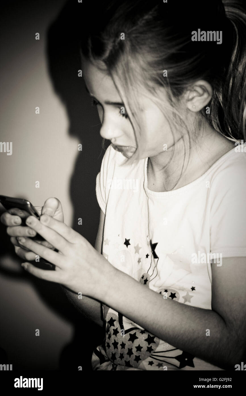 Young Girl Using iPod Stock Photo - Alamy