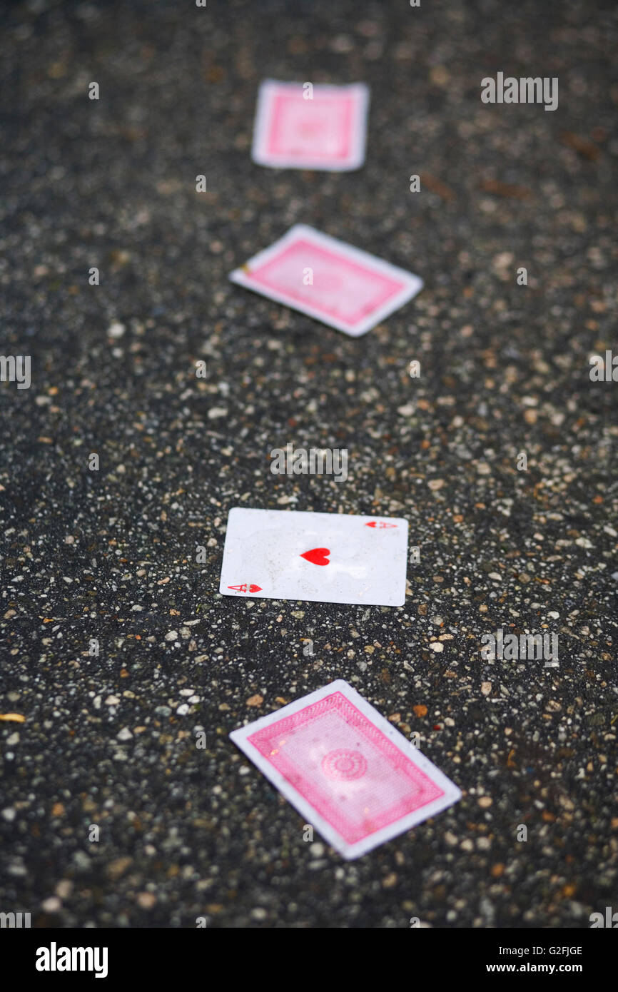 Playing Cards on Ground Stock Photo - Alamy