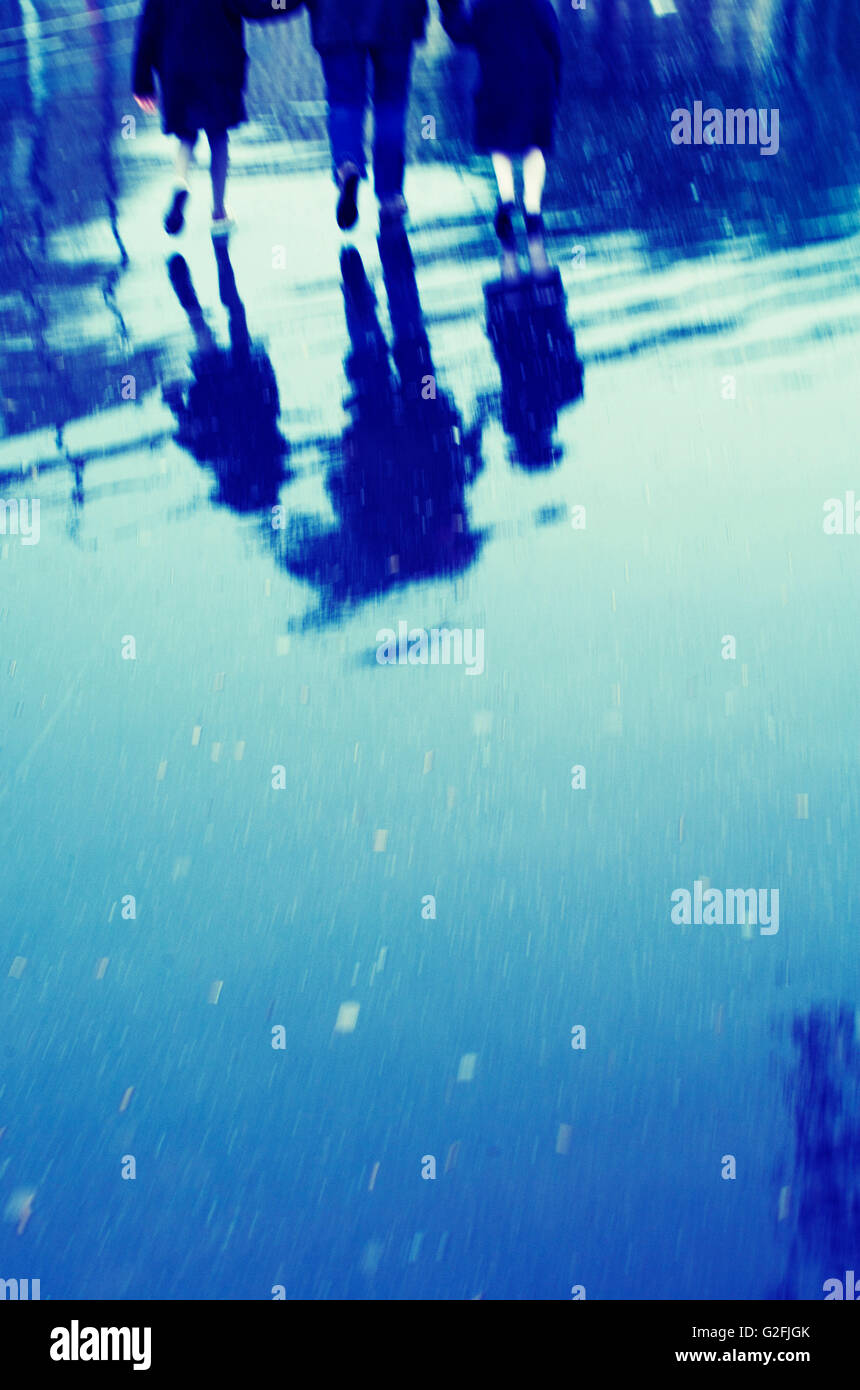 Reflection of Family Walking Stock Photo - Alamy