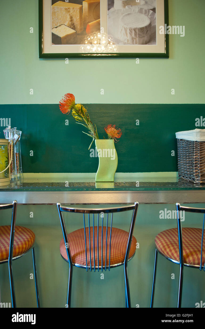 Dining Table With Flowers in Bistro Stock Photo - Alamy