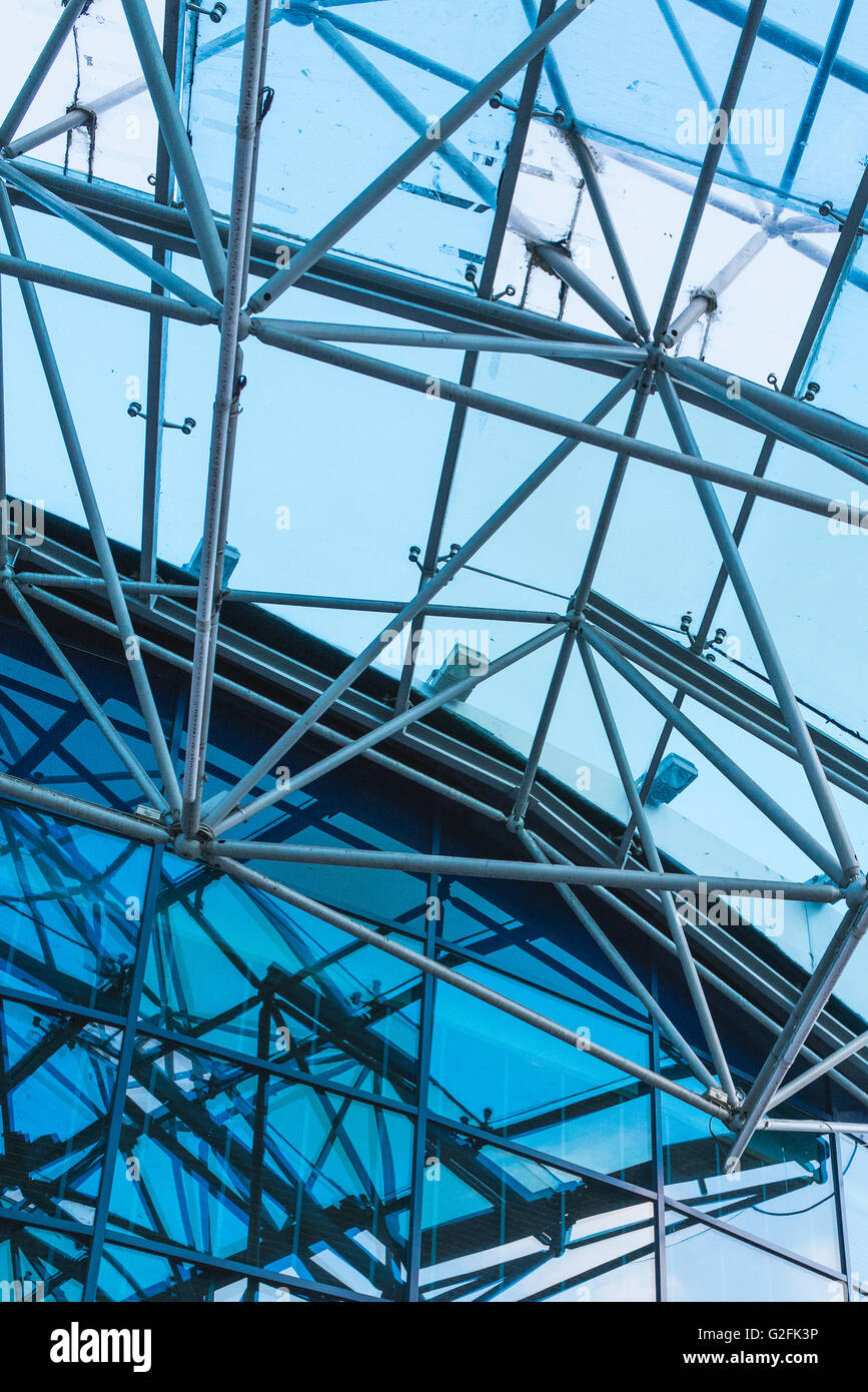 Bottom view of modern glass roof in business district in evening Stock ...