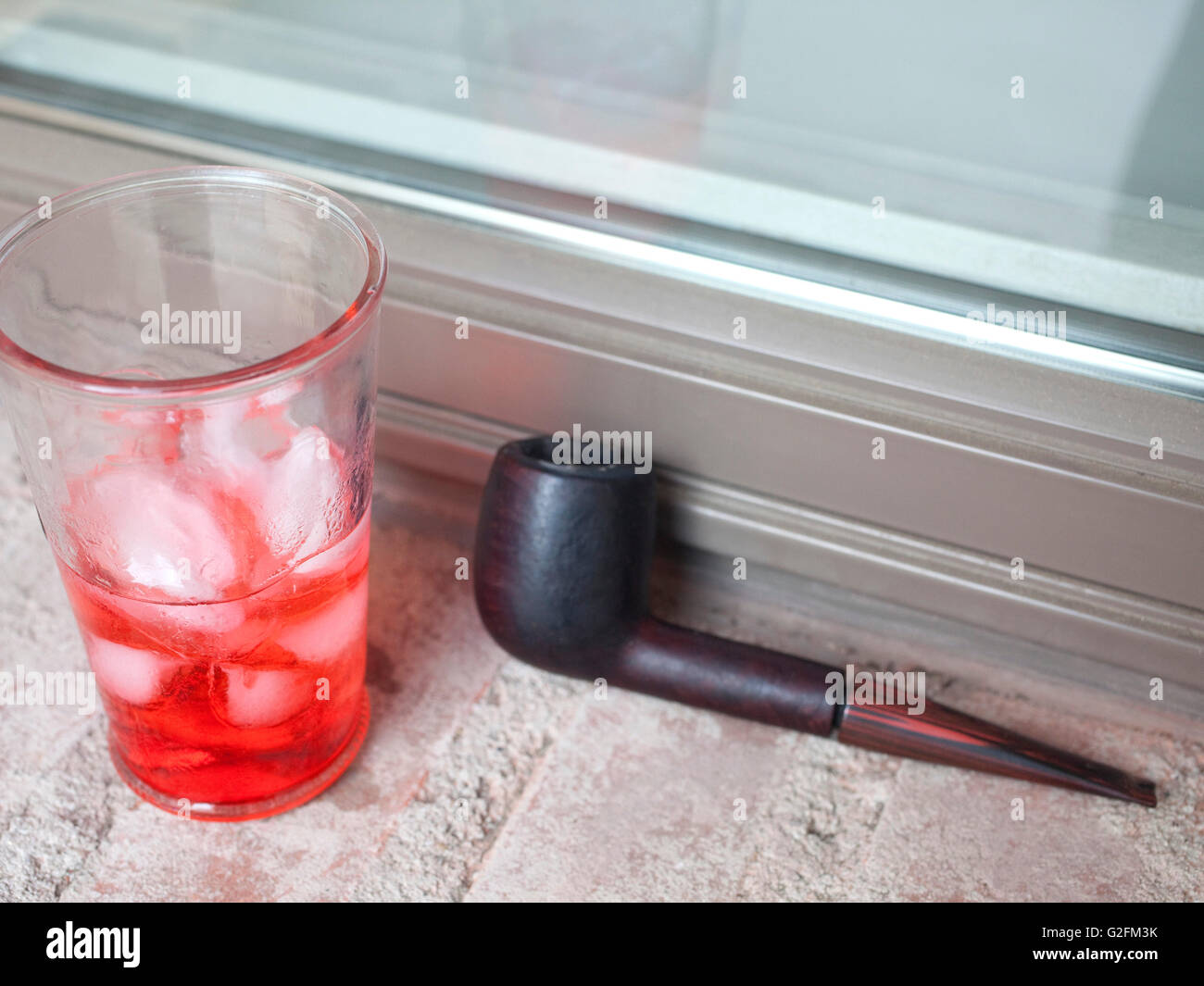 "Shirley Temple" and Pipe resting on window sill Stock Photo - Alamy