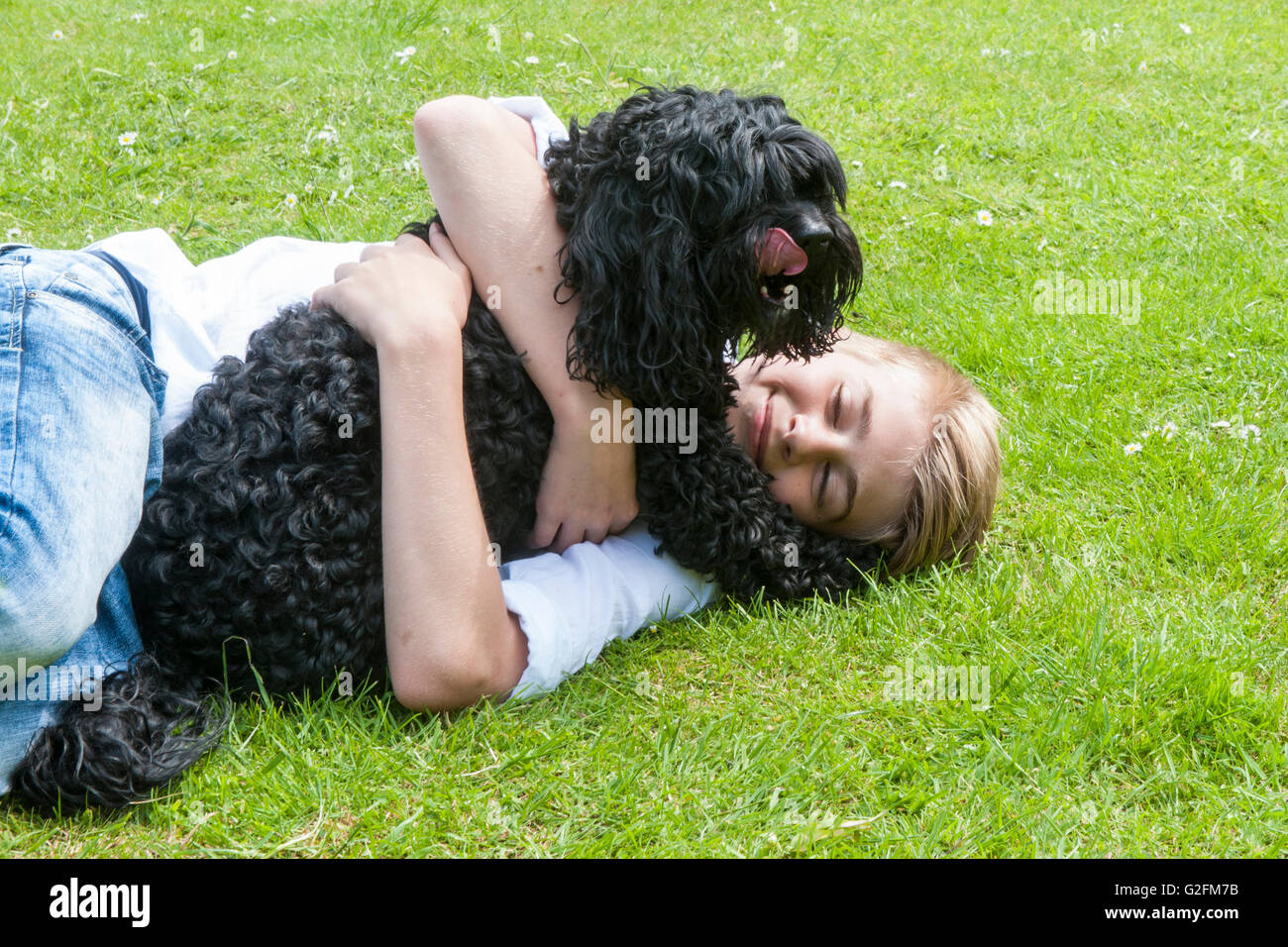 Boy hug dog hi-res stock photography and images - Alamy