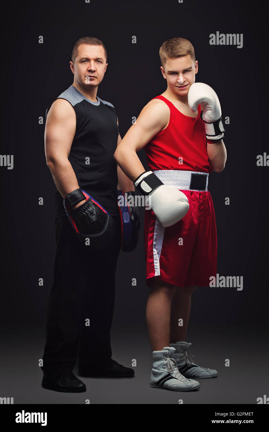 Young boxer with trainer Stock Photo - Alamy