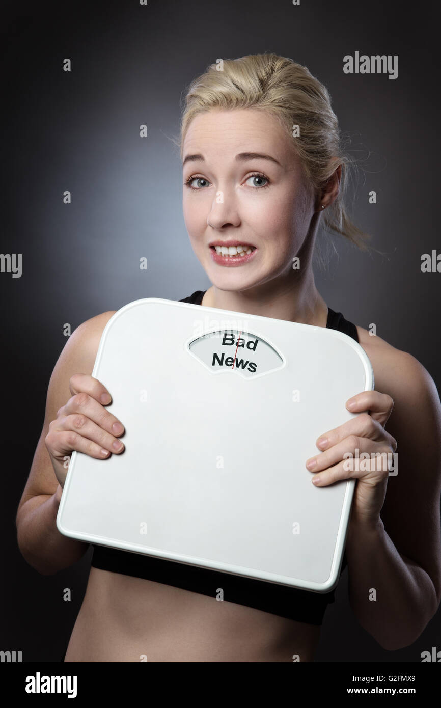 Woman scales disappointment hi-res stock photography and images - Alamy