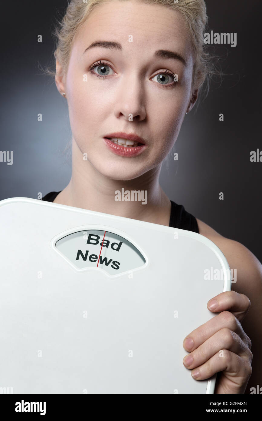 Woman scales disappointment hi-res stock photography and images - Alamy