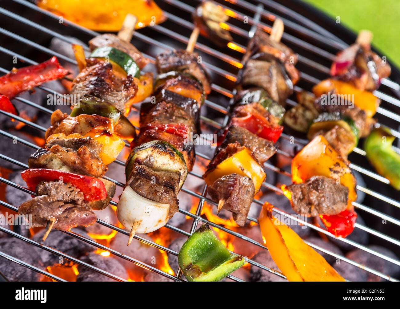 Grill with meat skewers shot from above view Stock Photo - Alamy