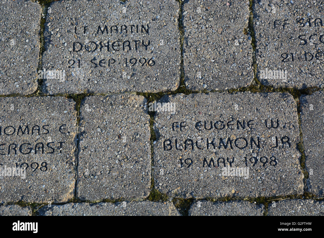 The names of fallen firefighter and EMT's adorn bricks at the Chicago ...