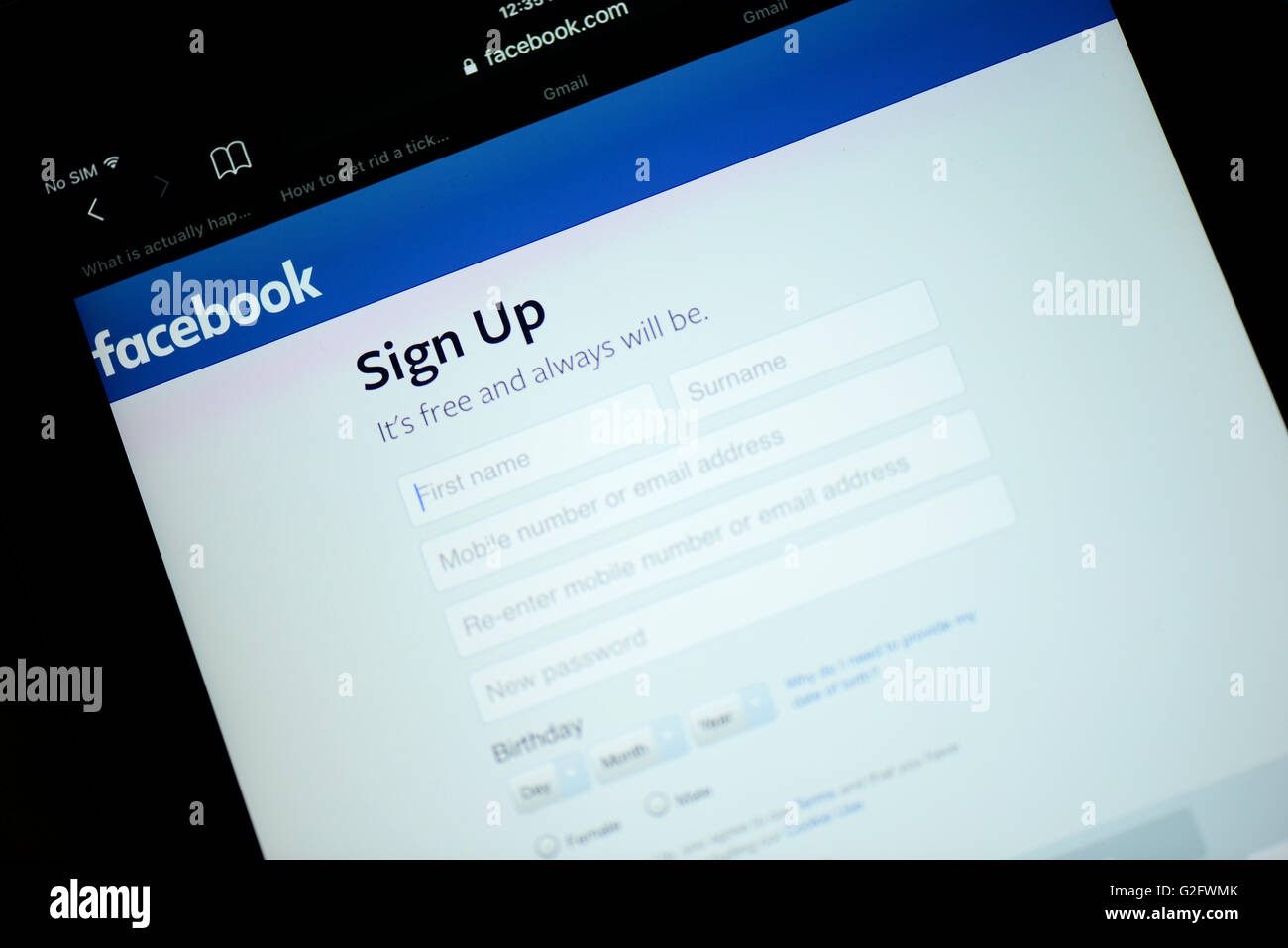 Facebook home page on laptop screen hi-res stock photography and images ...