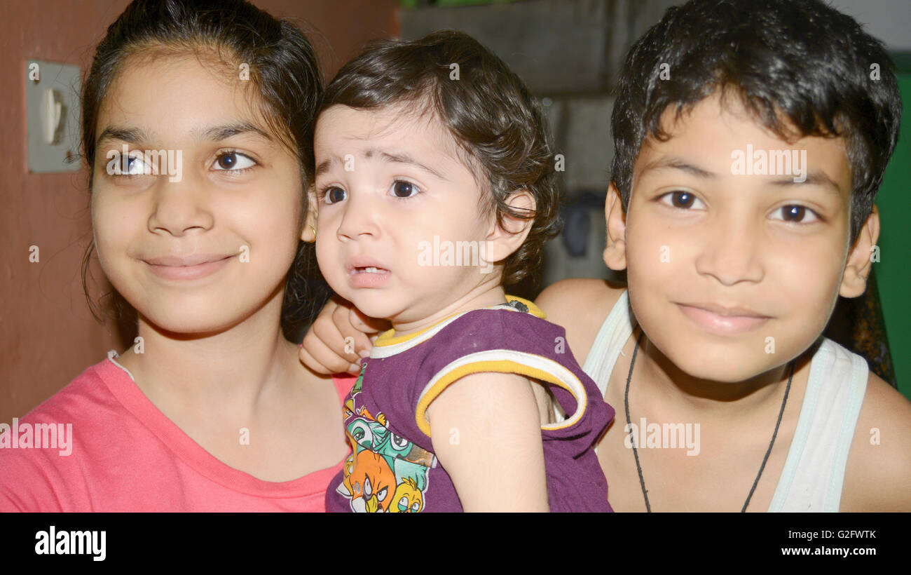 Three Baby's face Stock Photo - Alamy