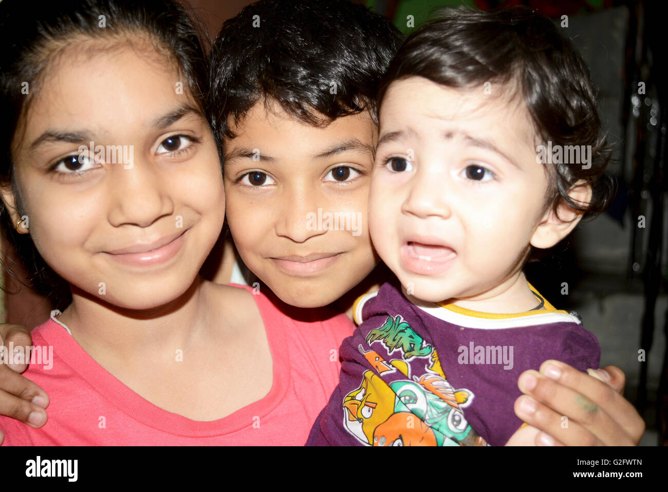 Three Baby's face Stock Photo - Alamy