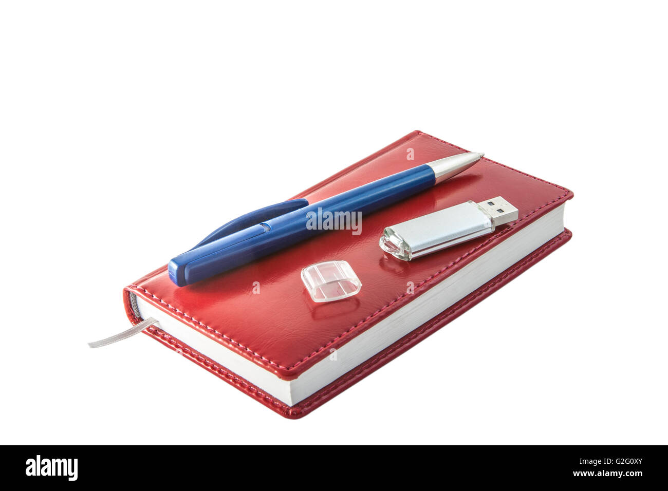 red notebook with the pen and a flash Stock Photo - Alamy