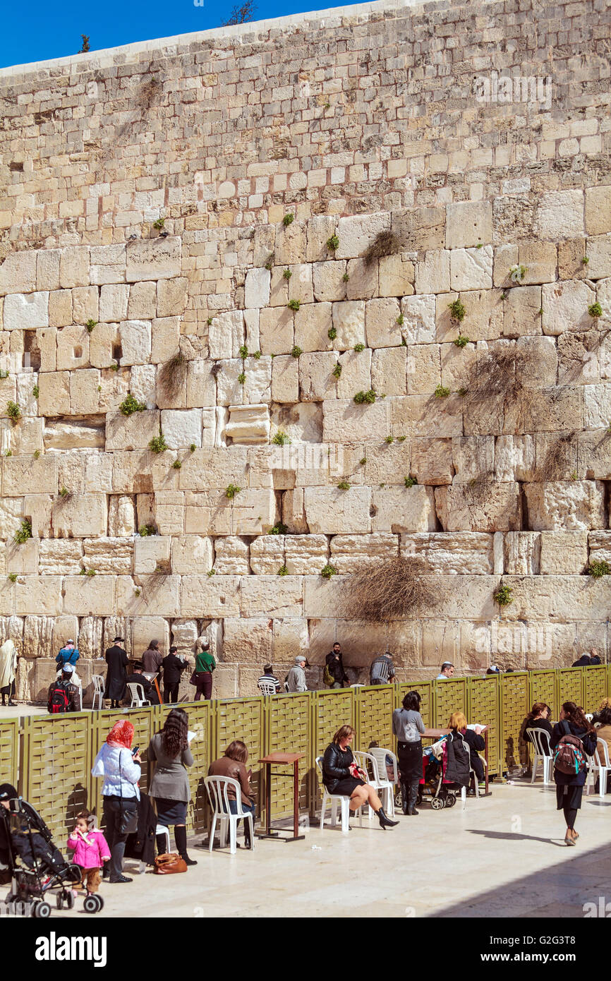 JERUSALEM, ISRAEL - FEBRUARY 17, 2013: People praying near Western Wall ...