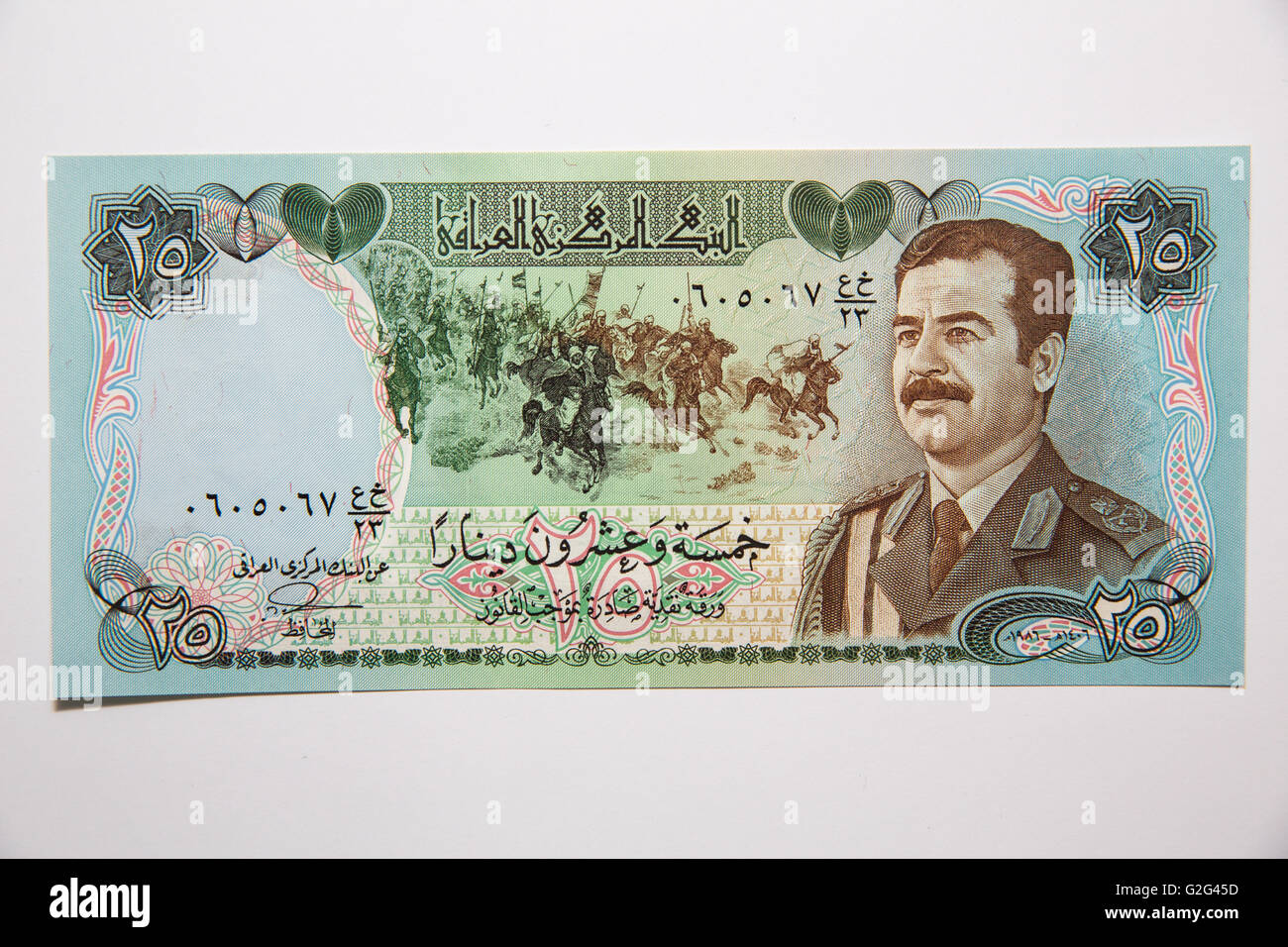 The front of the Iraq 25 Dinars note featuring Saddam Hussein Stock ...