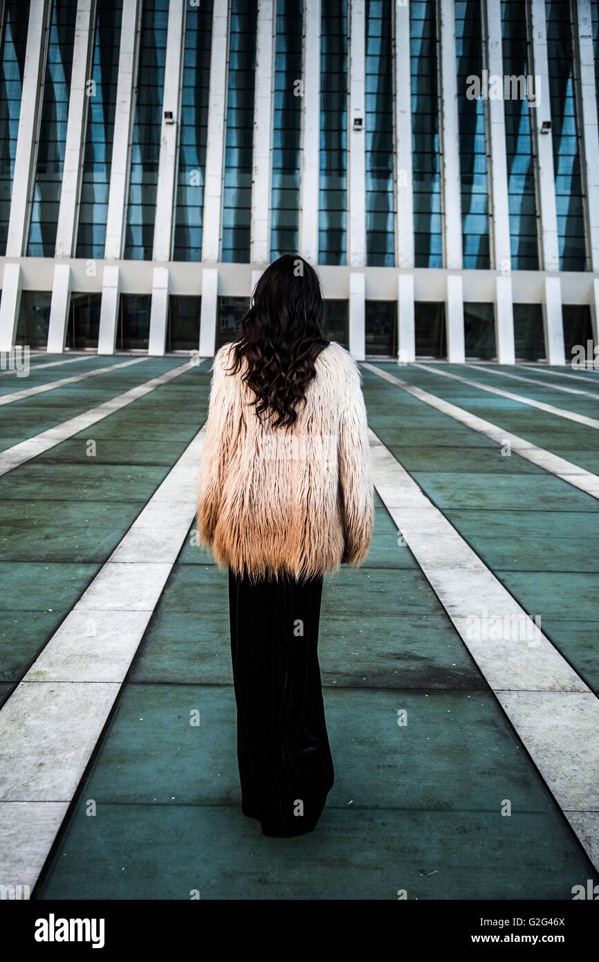 Rear View Portrait of Young Adult Woman with Long Hair in Fur Coat with ...