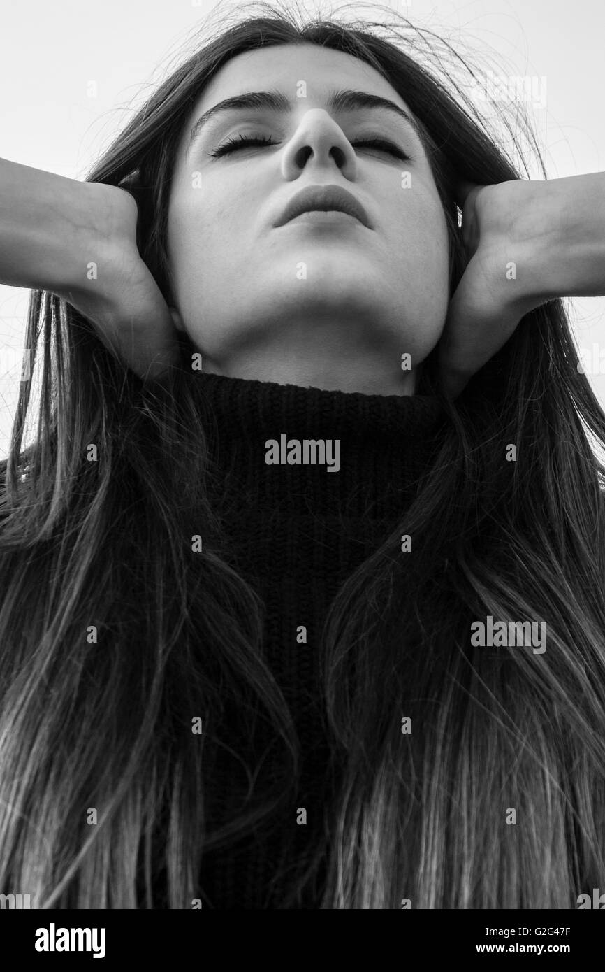 Woman ears hands behind hi-res stock photography and images - Alamy