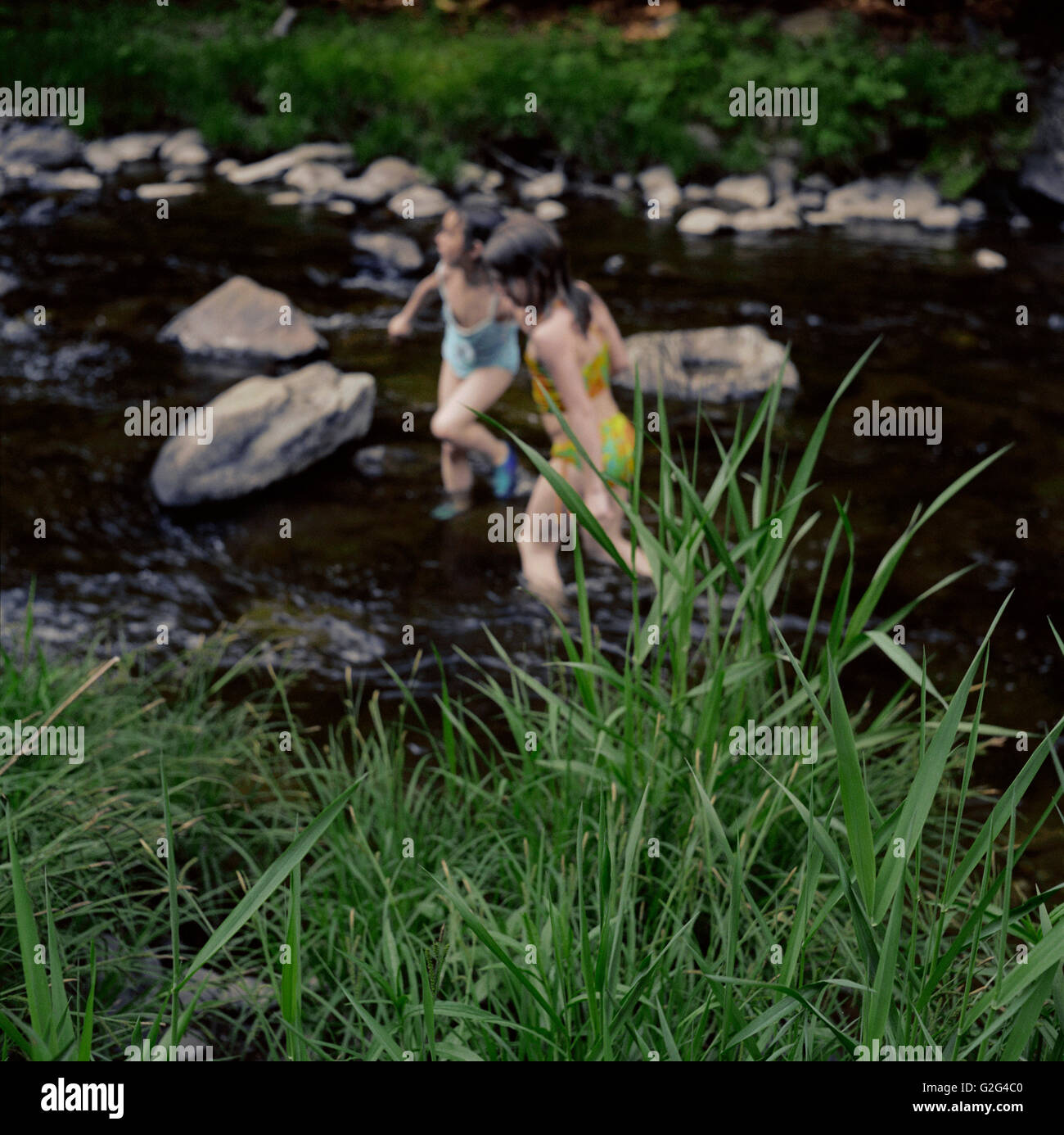 Girls in Stream 1 Stock Photo - Alamy
