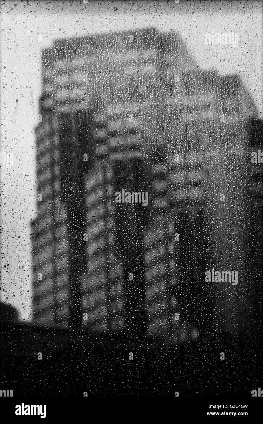Building Through Rainy Window Stock Photo - Alamy