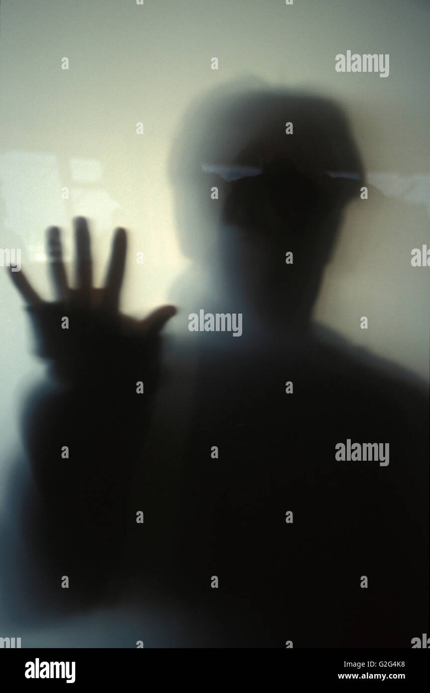 Man Behind Glass Stock Photo - Alamy