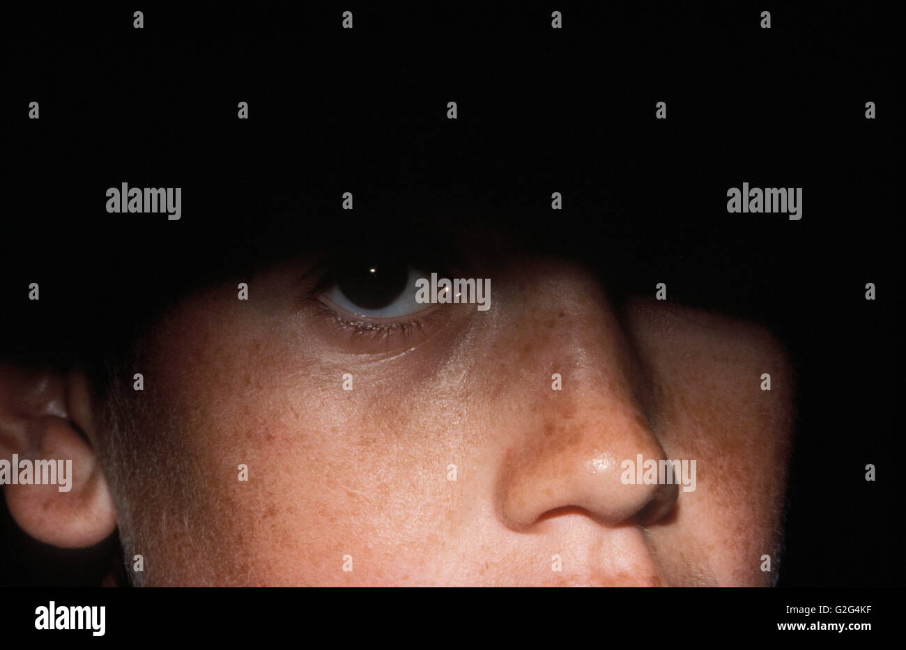 Face in Shadow Stock Photo - Alamy