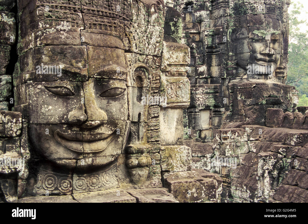 Smiling Stone Faces at Bayon Near Angkor Wat, Cambodia Stock Photo - Alamy