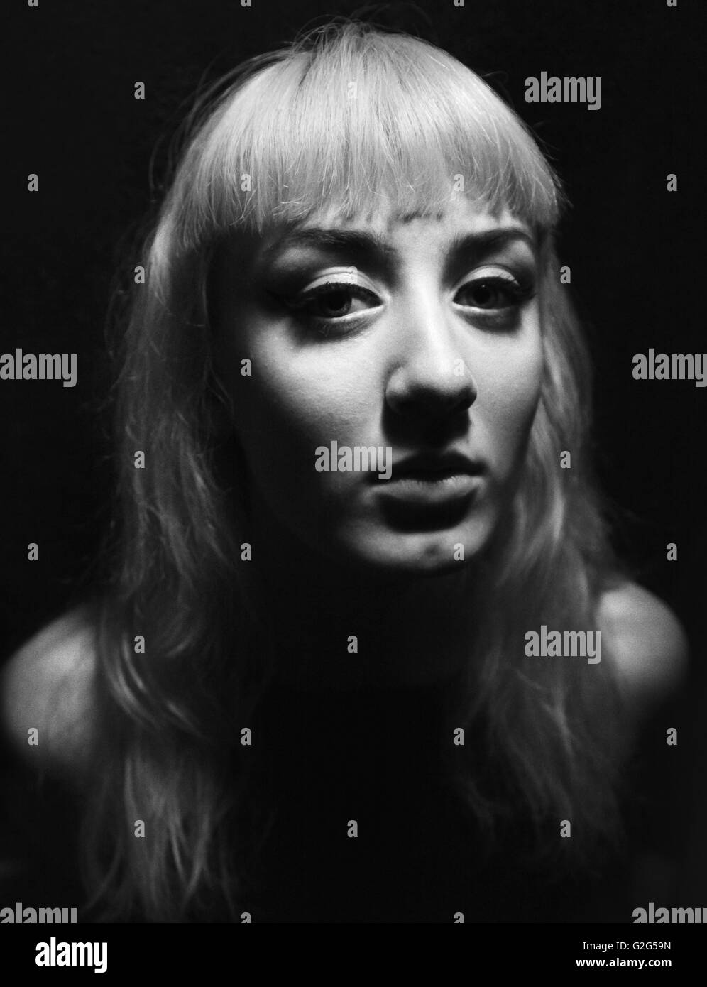 Face woman serious dramatic Black and White Stock Photos & Images - Alamy