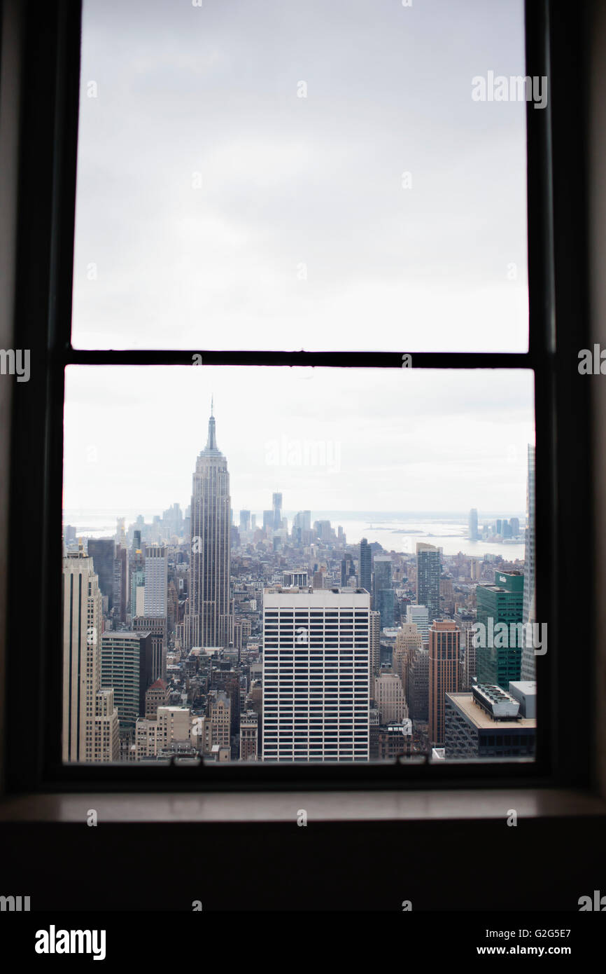 Empire state building through window hi-res stock photography and ...