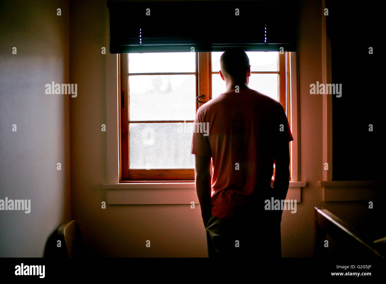 Staring at window silhouette hi-res stock photography and images - Alamy