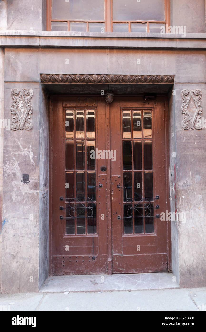Old rusty exterior door with glass windows Stock Photo - Alamy