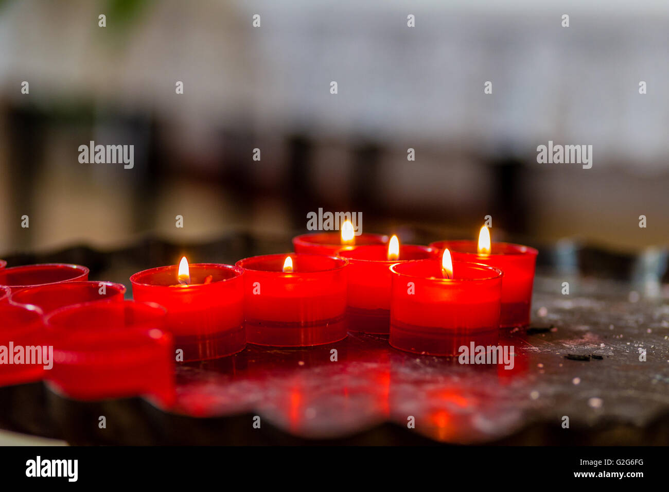 Cross formed of votive candles Stock Photo - Alamy