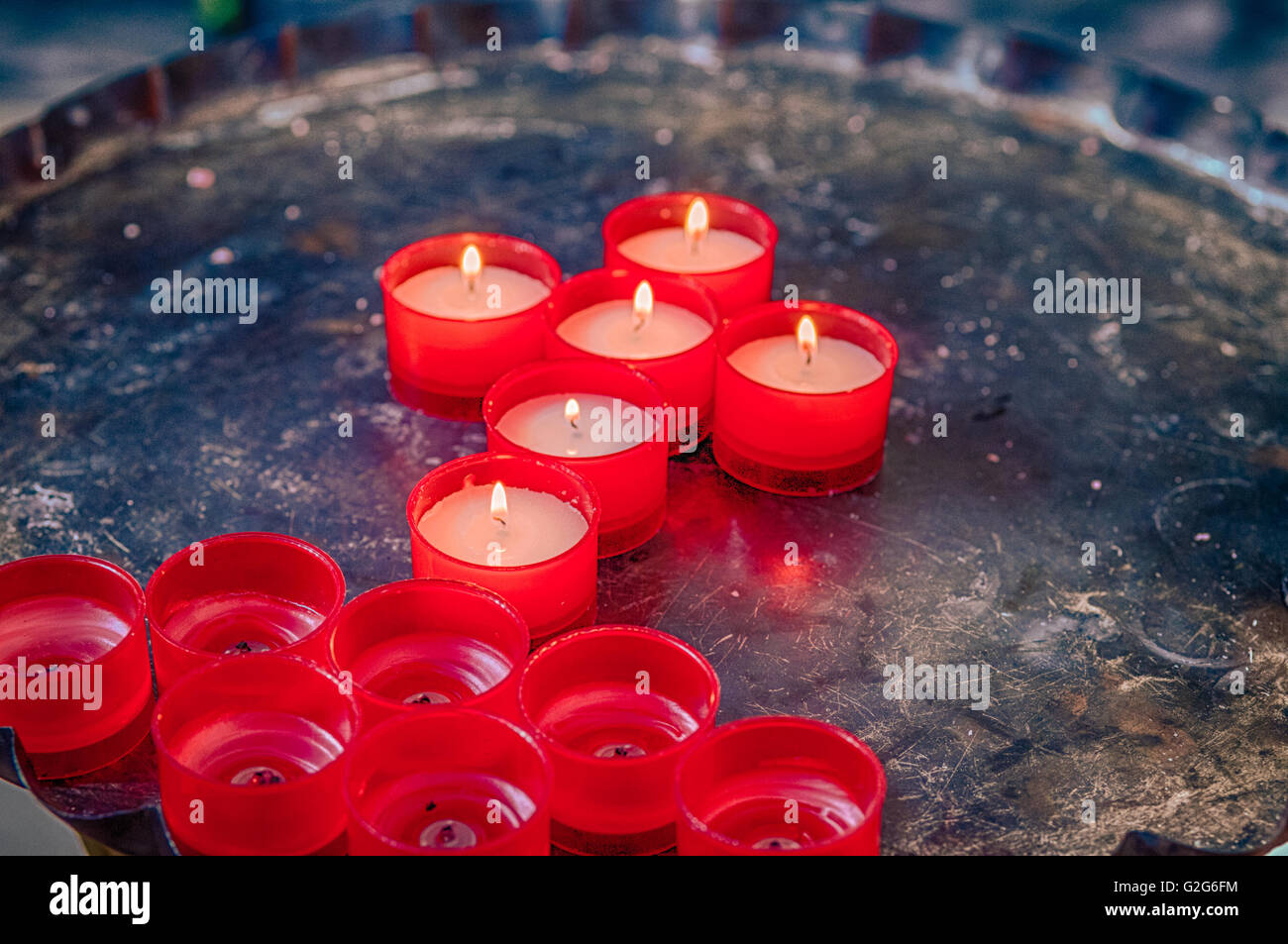 Cross formed of votive candles Stock Photo - Alamy