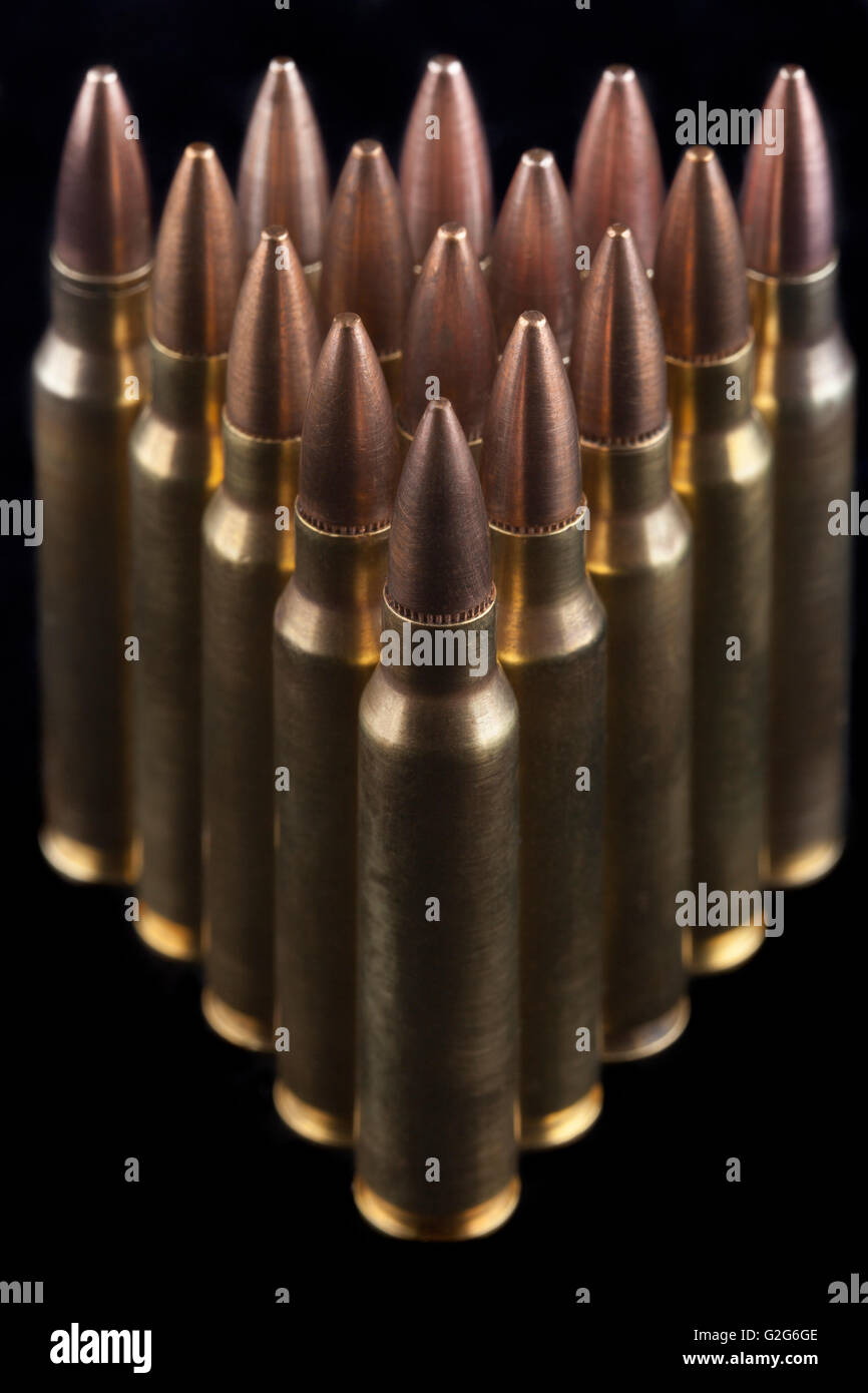 Rifle bullets close-up on black background Stock Photo - Alamy