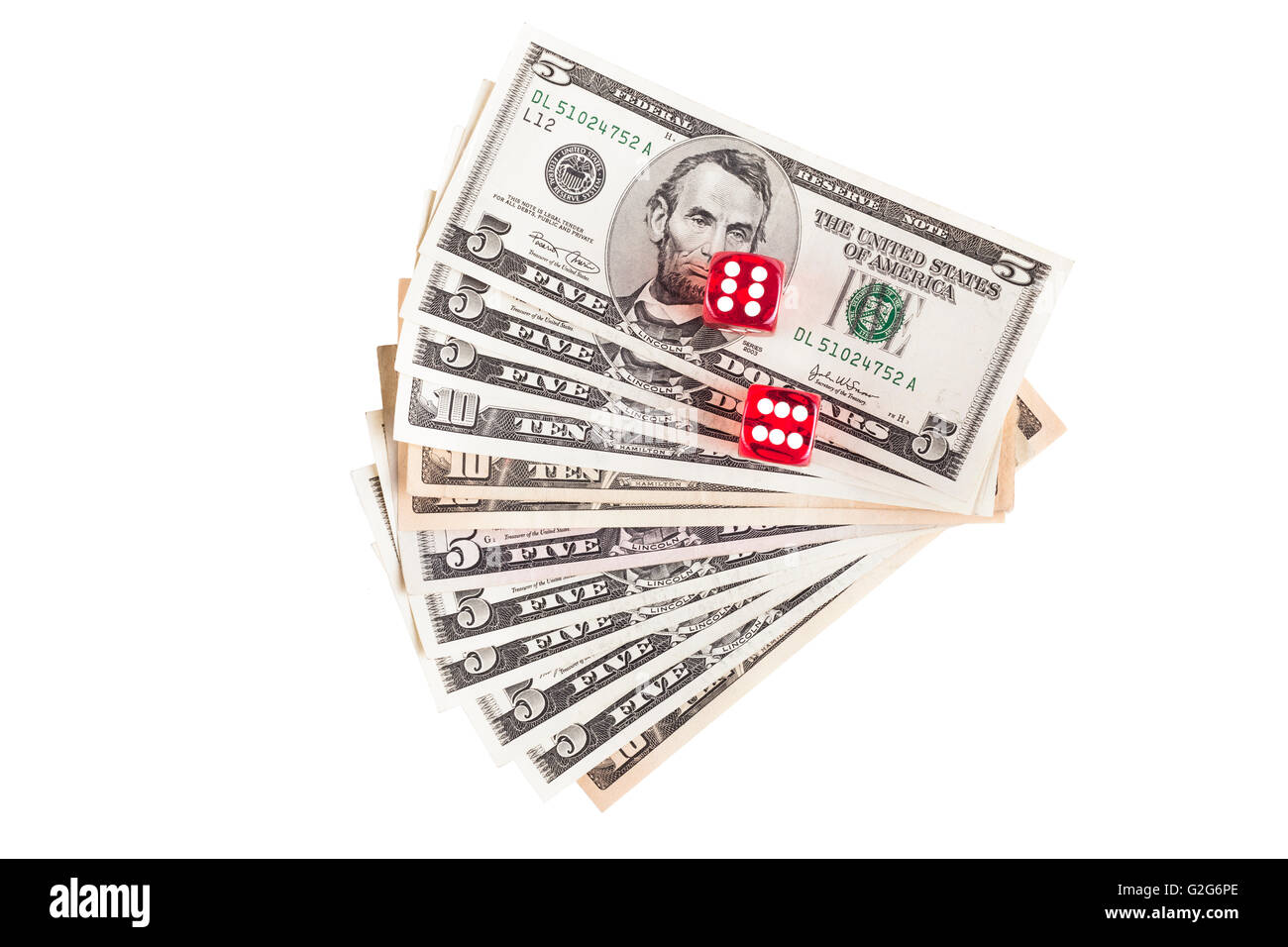Pair of red dice showing 6 on dollar banknotes isolated on white Stock ...