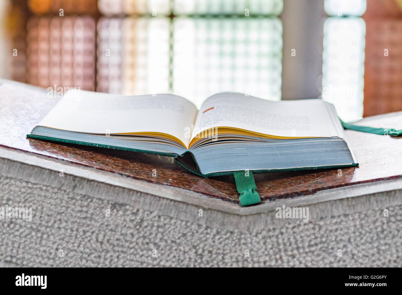 Gospel book open on the concrete pulpit to be read Stock Photo - Alamy
