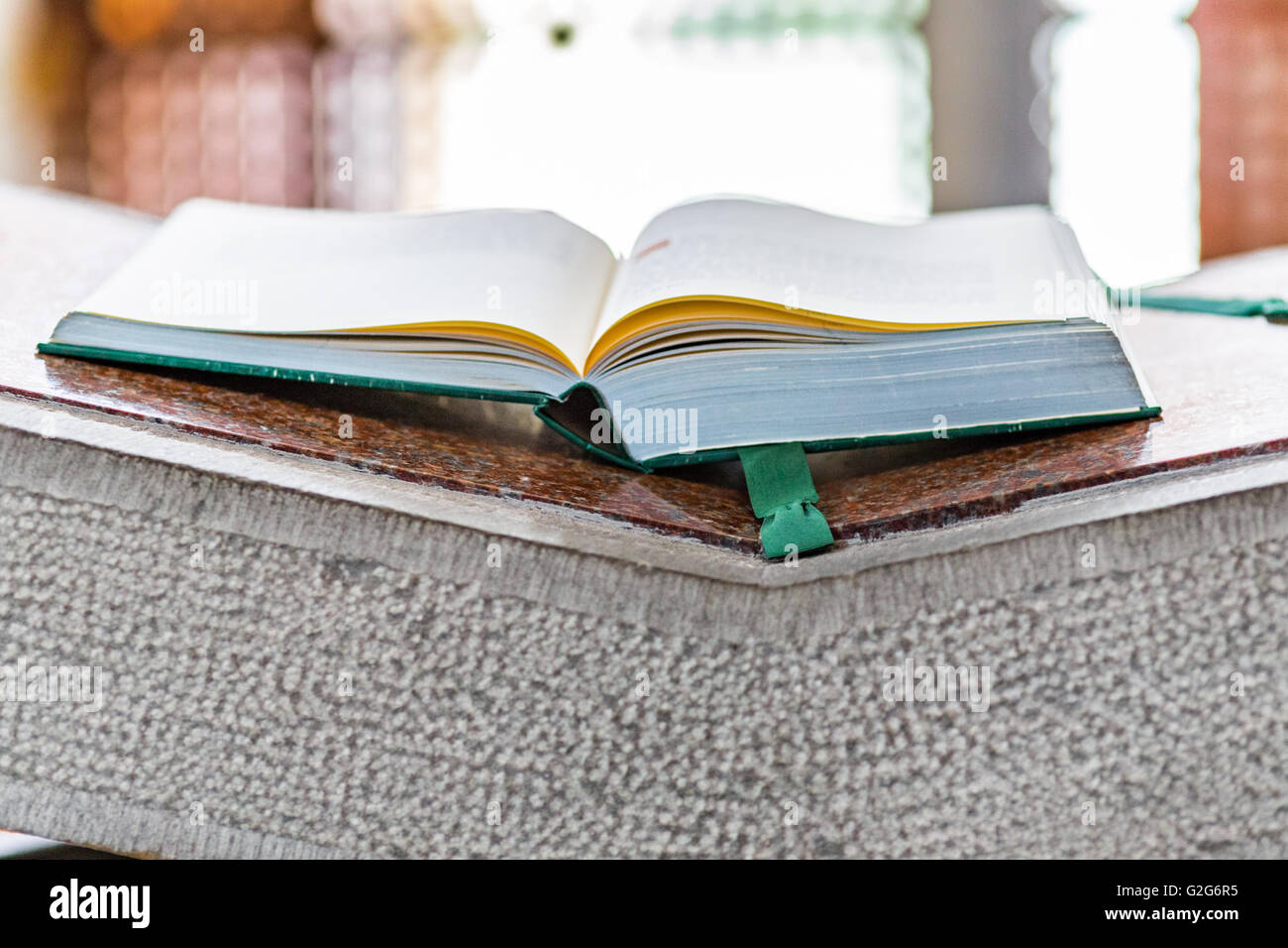 Gospel book open on the concrete pulpit to be read Stock Photo - Alamy