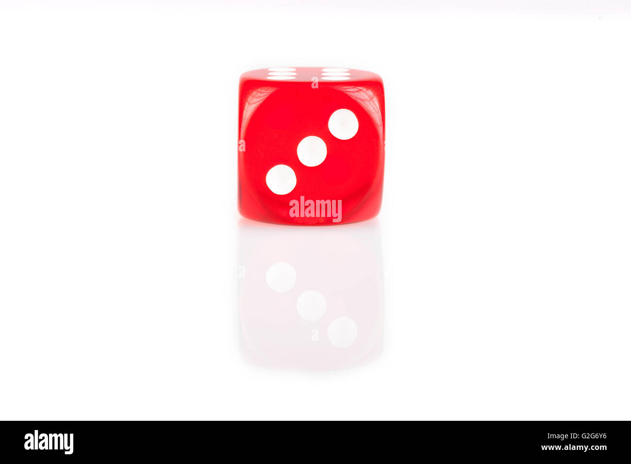 One red dice isolated on white background with reflection Stock Photo ...