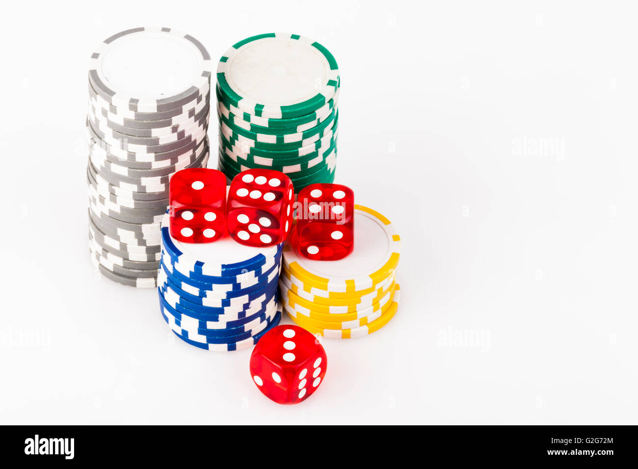 Four red dice with colored casino chips isolated on white background ...