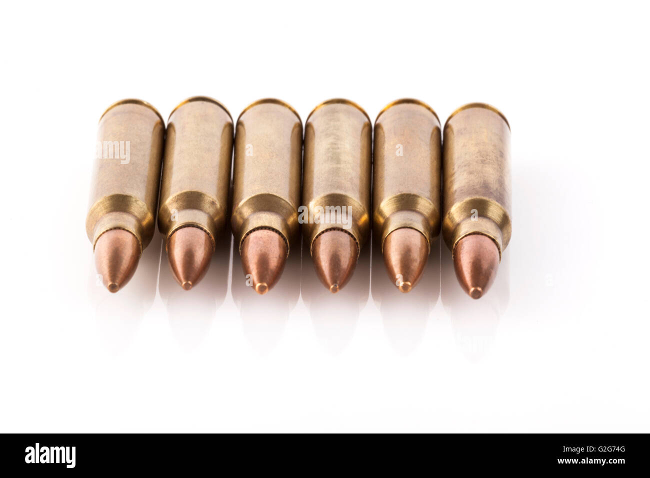 Six rifle bullets isolated on white background with reflection Stock ...