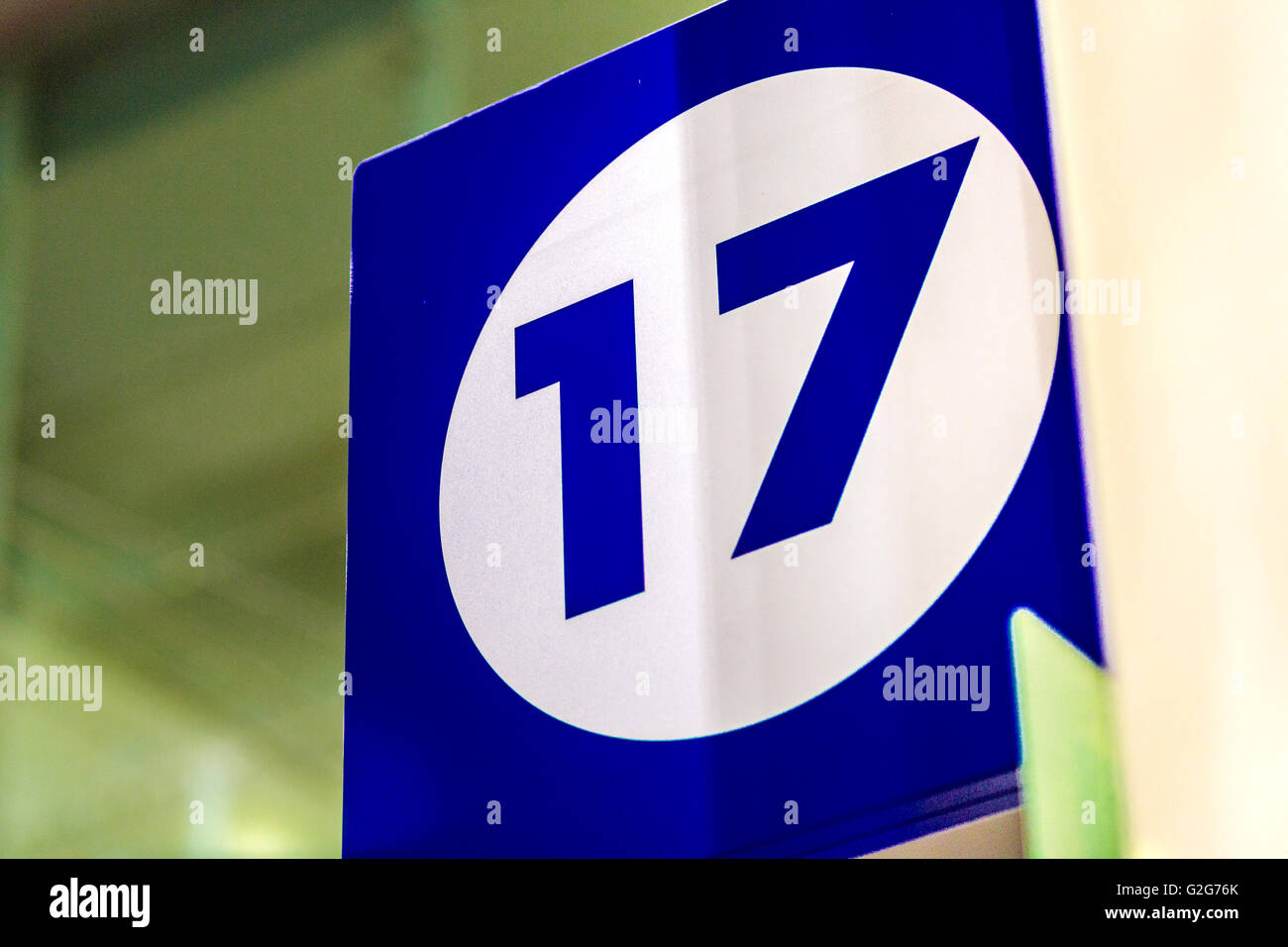 the number 17 on blue sign Stock Photo - Alamy
