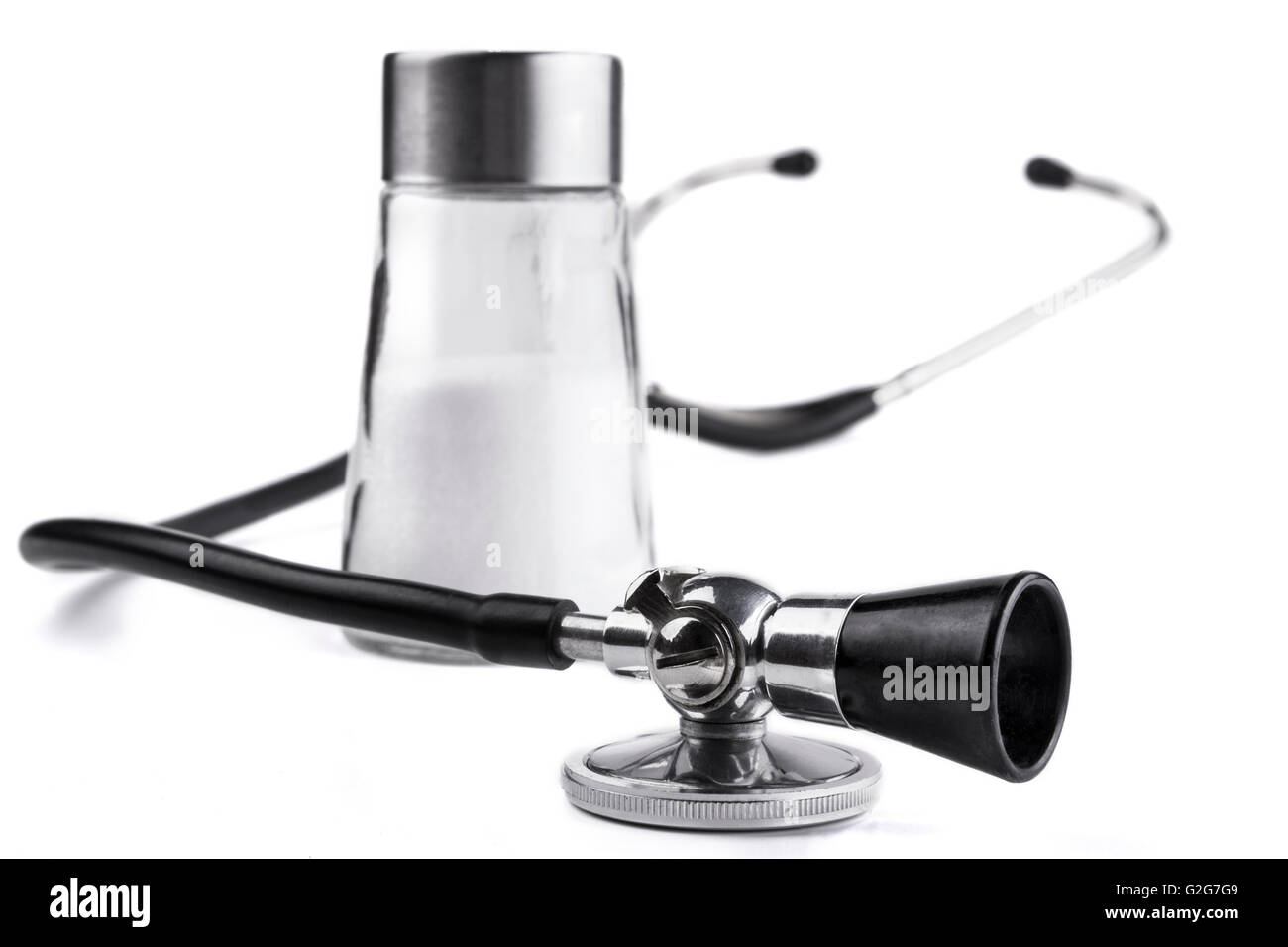 Black stethoscope closeup with salt isolated on white background Stock ...