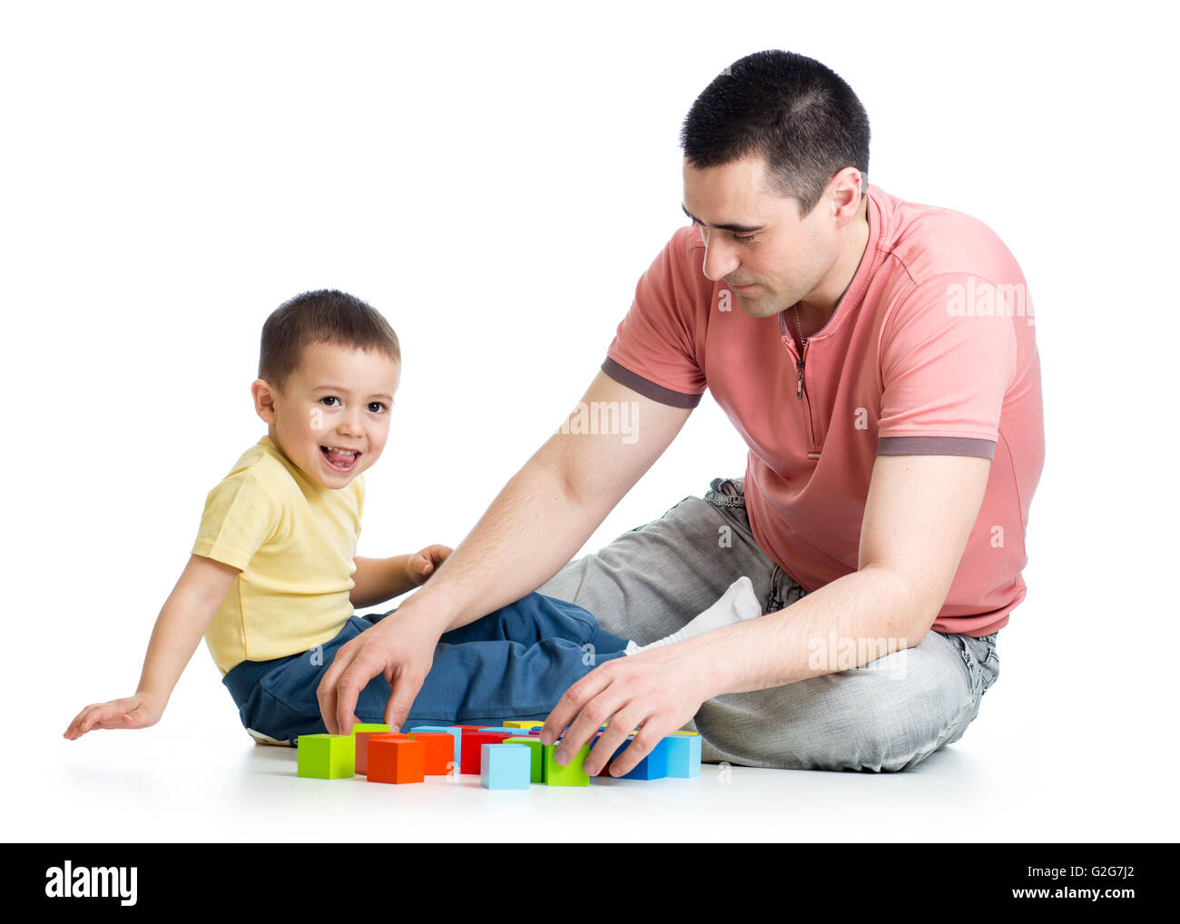 Child and his dad playing game together Stock Photo - Alamy