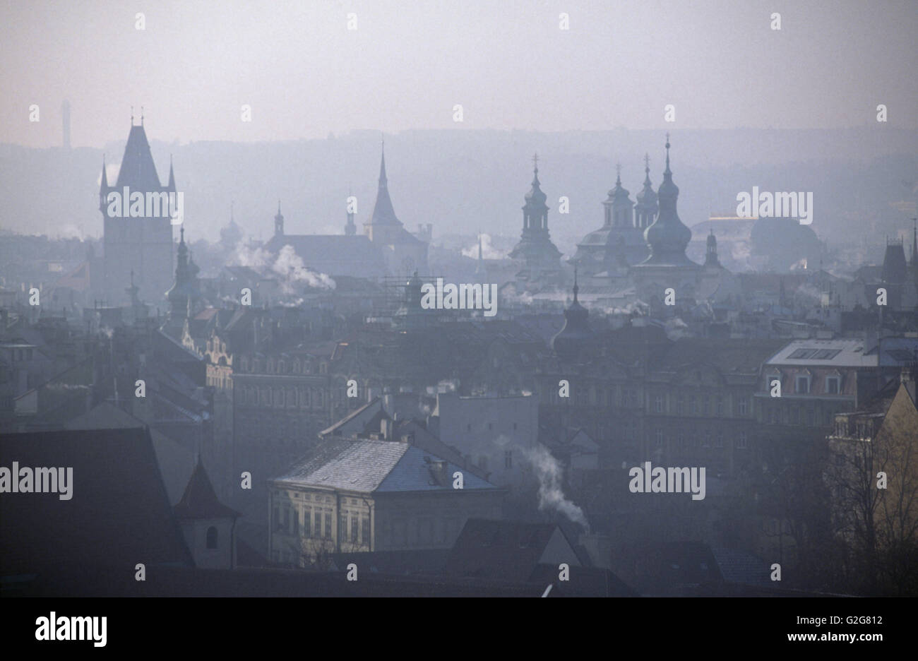 Smog over the city of Prague in winter. Smog is caused by atmospheric ...
