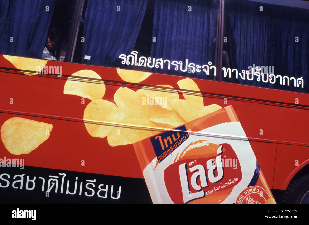 Bus in Bangkok, Thailand displaying advertisement for potato chips ...
