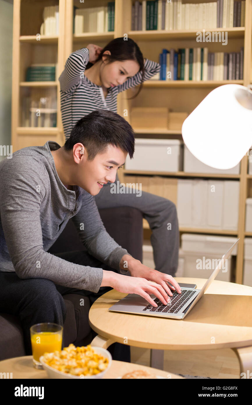 Man ignoring girlfriend laptop hi-res stock photography and images - Alamy