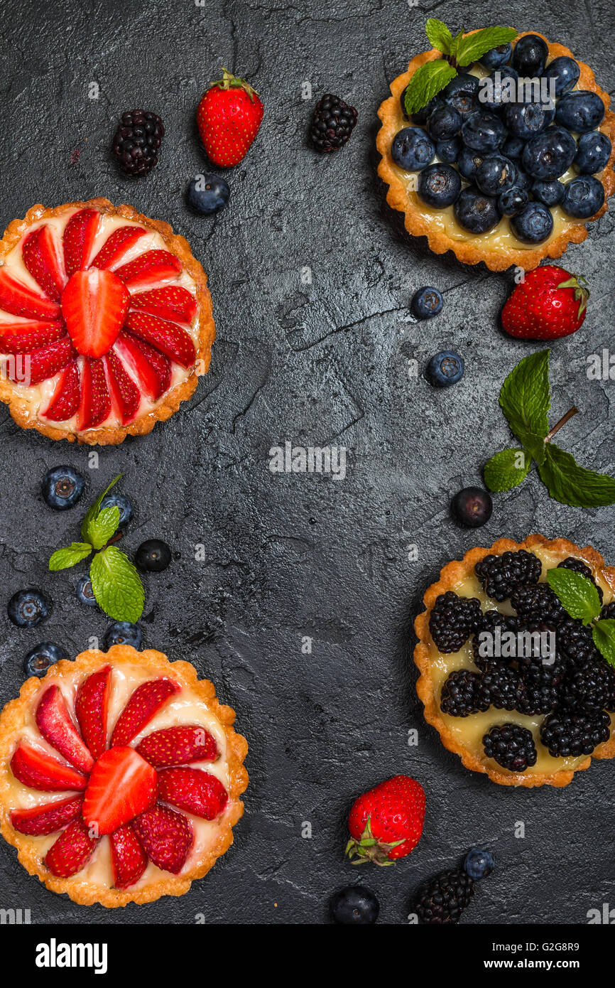 Tarts with lemon cream and fresh berries Stock Photo - Alamy