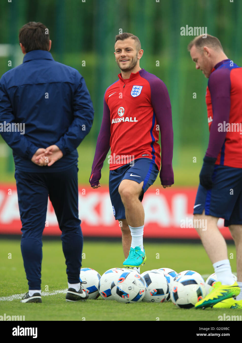 England's Jack Wilshere (centre) and Wayne Rooney (right) during a ...